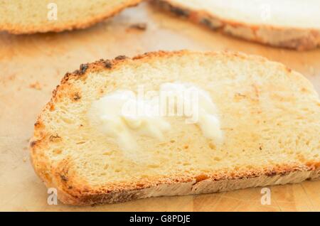 Butter melting on hot toast Stock Photo - Alamy