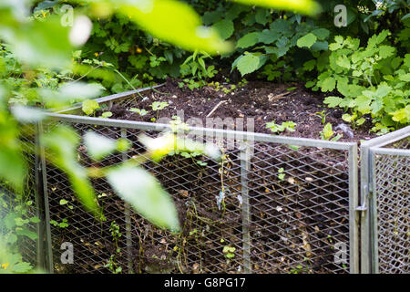 Metal garden compost bin Stock Photo - Alamy
