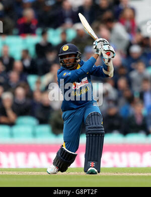 Kusal Mendis of Sri Lanka hits the ball for four runs during the 3rd ...