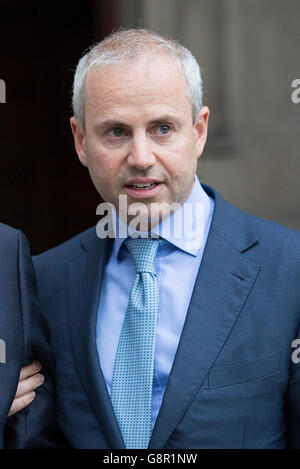 Ocado chief executive Tim Steiner (right) leaves The Royal Courts of ...