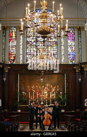 The Ruisi Quartet (left to right) Alessandro Ruisi (playing violin ...