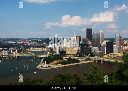 An Aerial view of Pittsburgh downtown skyline with bridges on under ...