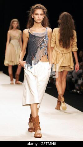 Models wear creations by designer Bora Aksu during their Spring/Summer ...