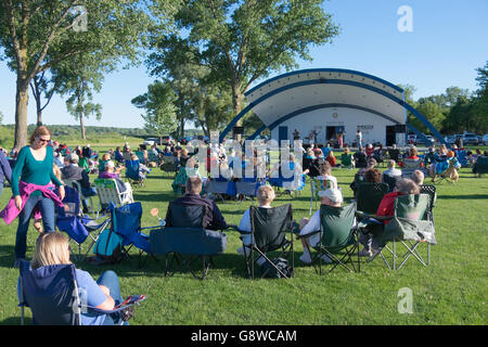 Outdoor community concert at the band shell in Montague, Michigan, USA ...
