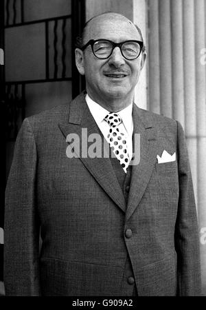 Mr Joe Coral, the bookmaker, and his wife Dorothy leave their home in ...