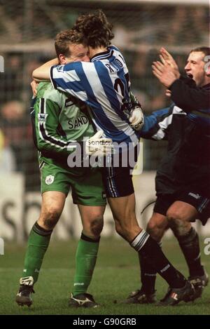 Sheffield Wednesday goalkeeper Kevin Pressman leaving the pitch after ...