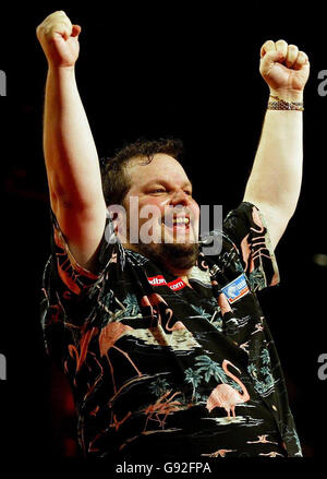 Peter Manley celebrates after winning his match against Adrian Lewis ...