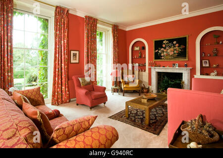 UK. A large traditional formal drawing room with a grand piano Stock ...