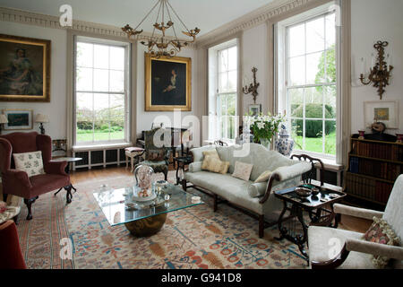 UK. A large traditional formal drawing room with a grand piano Stock ...