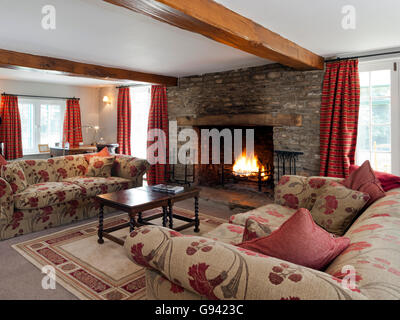 A traditional living room with an open fire in a Georgian townhouse in ...