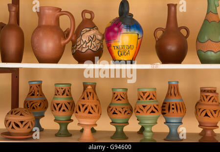 Trinidad Cuba clay pottery business with man working on pottery wheel ...