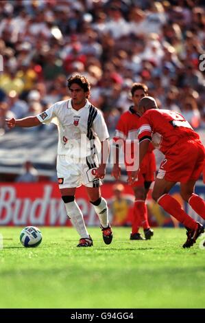 D.C. United's Jaime Moreno, left, goes up for a header with San Jose ...
