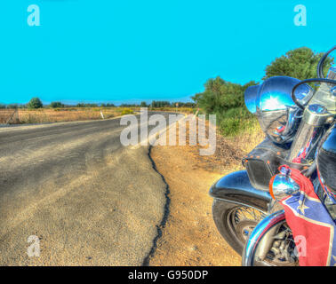 classic motorcycle on the edge of the road at sunset Stock Photo - Alamy