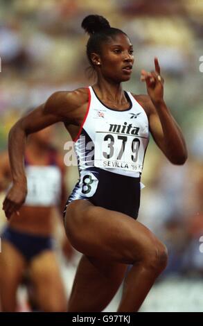 Britain's Denise Lewis takes part in the High Jump section of the ...