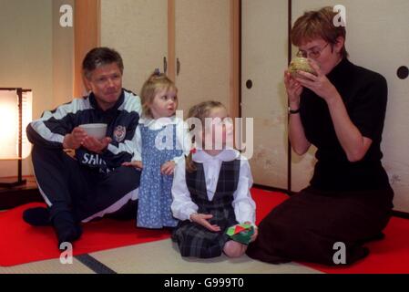 Steve Perryman and his daughters watch Kim, Steve's wife drink Japanese ...