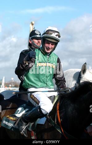 Niall 'Slippers' Madden celebrates winning in The JohnSmith's Grand ...