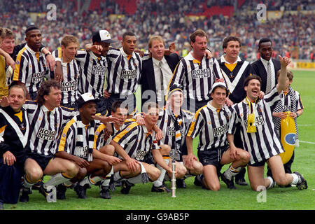 Notts County celebrate gaining promotion to Division One: (back row, l ...