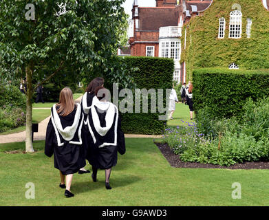Smiling students celebrates her graduation at Cambridge University ...