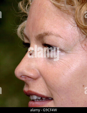 BBC Springwatch presenter Kate Humble poses with a Banded Demoiselle ...