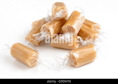 Individually wrapped caramel or fudge candy Stock Photo - Alamy