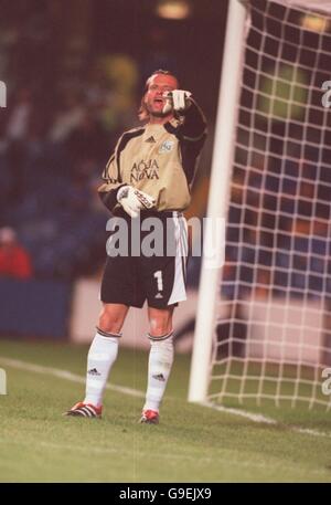 St Gallen goalkeeper Jorg Stiel jumps on Patrick Winkler in celebration ...