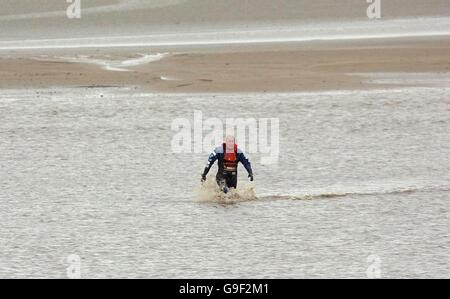 Graham Boanas, 43, after finishing his walk across the River Mersey ...