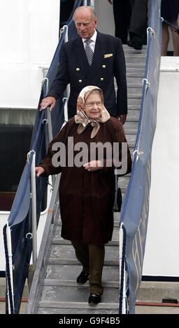 Britain's Princess Elizabeth and the Duke of Edinburgh kneel before the ...