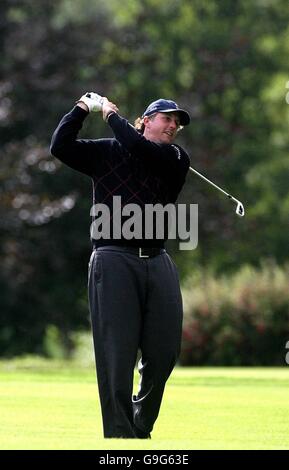 U.S. team members Phil Mickelson and Dustin Johnson stand under their ...