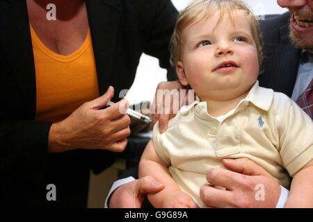 (Left to right) Dr O'Hare from Belfast, with baby Gabriel McConkey and ...