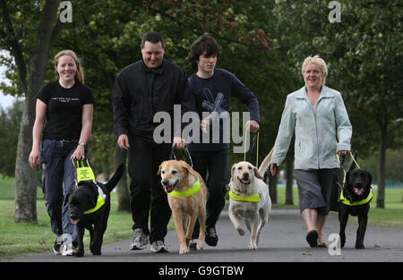 The Turnham family with their guide dogs (left to right) Sue with Jo ...