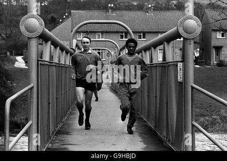 Bradford City manager Bryan Edwards (l) and Ces Podd (r) cross a bridge ...