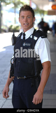 Police Constable Mark Carter on duty on the streets of Huddersfield ...