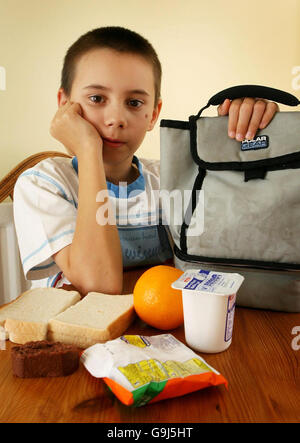 Ryan Stupples, 10, with examples of his packed lunch after was made to ...