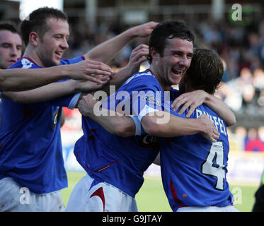 Rangers' Thomas Buffel celebrates with Barry Ferguson (R) after scoring ...