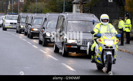 The hearses carrying the bodies of five members of the same family ...