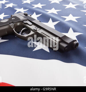 Part of ruffled national flags with hand gun over it series - USA Stock ...