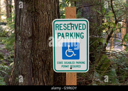 Physically challenged handicapped parking sign in the woods in Ridley ...