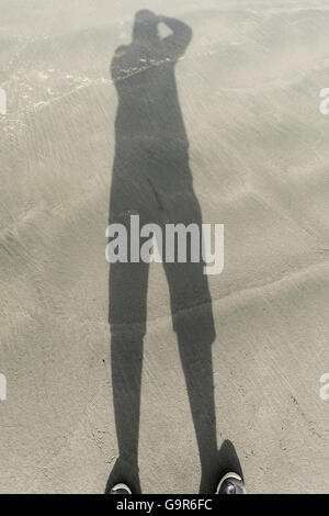 Shadow of photographer cast on water tank Stock Photo - Alamy