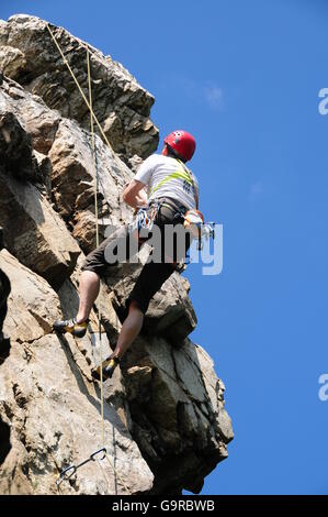 Rock Climbing, abseiling, abseil, rappell, roping down Stock Photo - Alamy