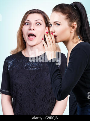 Two women gossip Stock Photo - Alamy