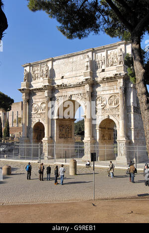 A vertical shot of Arch of Constantine in Rome, Italy surrounded by ...