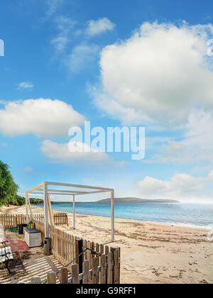 Mugoni beach shoreline under a cloudy sky Stock Photo - Alamy