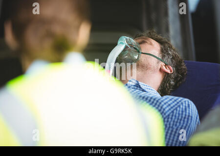 Man wearing oxygen mask Stock Photo - Alamy