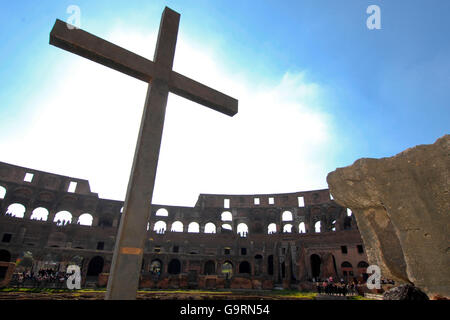 Cross at the Colosseum in Rome, Italy. The cross is dedicated to ...