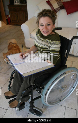 Paraplegic student 'degraded' by carers Stock Photo - Alamy