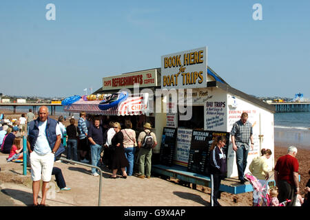 Devon Stock - Paignton. A general view showing the sea front and pier ...