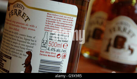 Government health warning for alcoholic drinks. A drink unit label ...