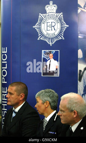 Detective Superintendent Keith Garwood (left) briefs the press outside ...
