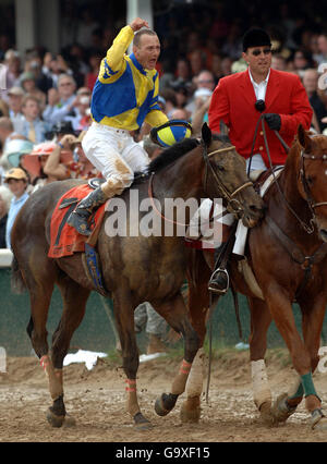 Street Sense and jockey Calvin Borel cross the finish line to win the ...