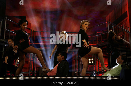 The cast, including Abi Ryan (L) and Annika Gabbitas, perform during ...